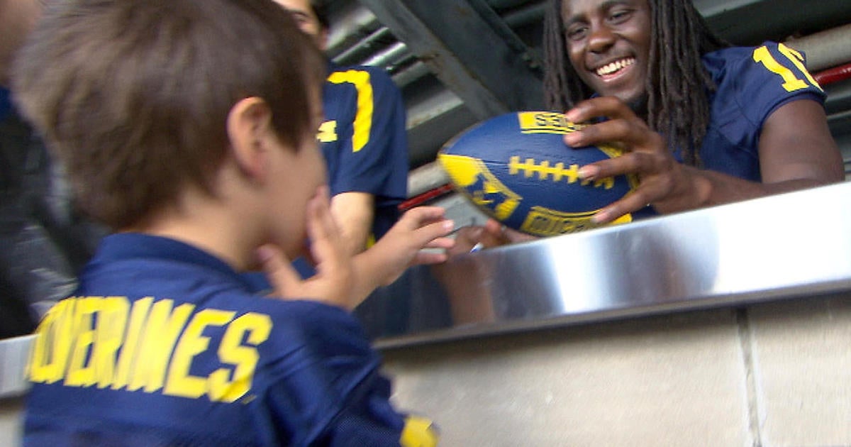 Behind the scenes with Michigan football - CBS News